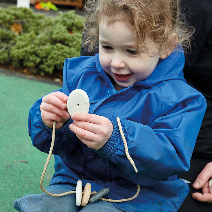 Engage with Tactile Threading Pebbles: Versatile Learning Set